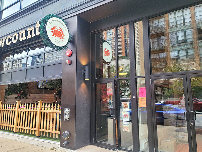 The crab logo says it all—prepare for a hands-on seafood experience that laughs in the face of fancy dining.