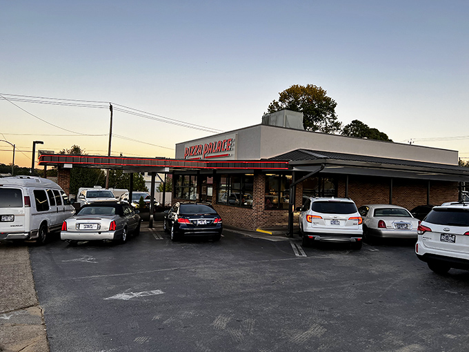 When the parking lot's this full at Pizza Palace, you know you've found the real deal. Follow the locals to pizza paradise.