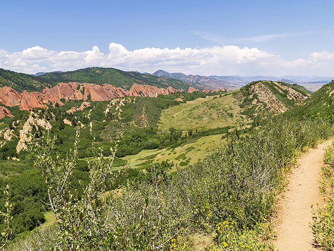 Nature's cathedral at Roxborough, where red sandstone formations reach dramatically skyward. No admission fee for this spectacular show.
