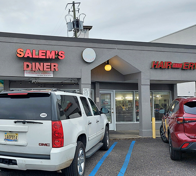 Salem's glowing sign against the evening sky&mdash;like a lighthouse guiding breakfast enthusiasts safely to shore.