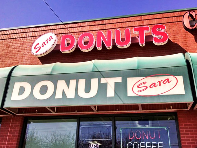 The bold red lettering shouts what you need to know &ndash; DONUTS! No fancy frills, just straight-up donut perfection waiting behind those doors.