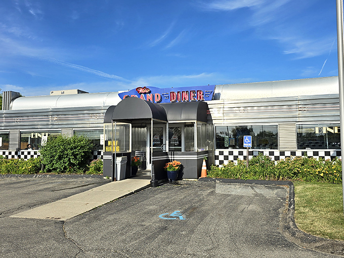 Classic American diner architecture at its finest &ndash; The Grand Diner's polished chrome exterior promises pancakes that would make your grandmother proud.