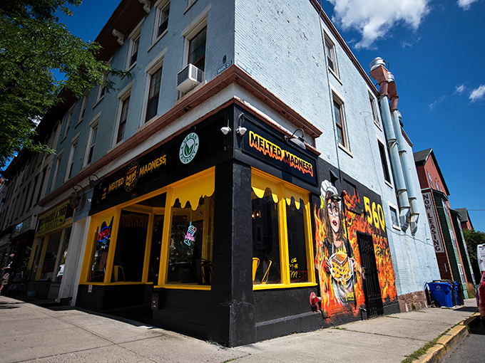 Sunshine-yellow storefront with attitude to match. Middletown's temple of molten cheese stands out like a delicious fever dream.
