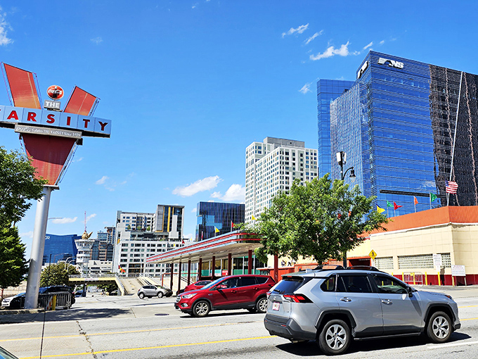 Downtown Atlanta's skyline frames The Varsity perfectly&mdash;where generations have savored chili dogs and Frosted Oranges while watching the city grow around them.