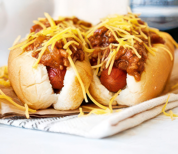 Chili dogs at Garcia's&mdash;where the cheese melts just right and the chili has that perfect balance of spice. A symphony of comfort in every bite.