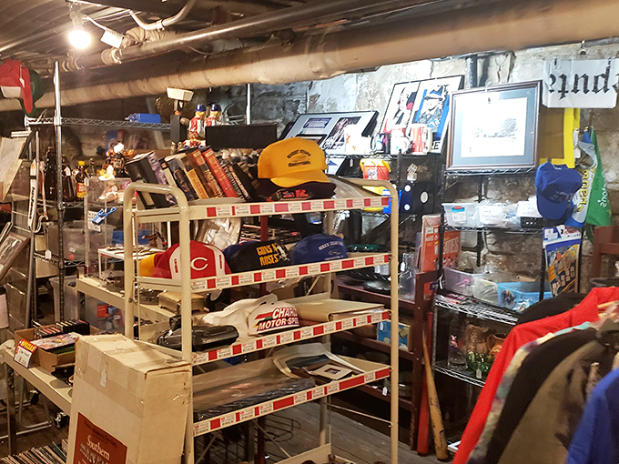 The basement level reveals a treasure hunter's paradise, where Cincinnati Reds memorabilia and vintage books await their next caretaker.