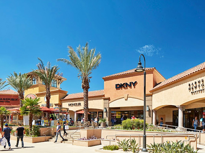 High-end fashion in the high desert: DKNY and Moncler storefronts bask in that perfect California sunshine.