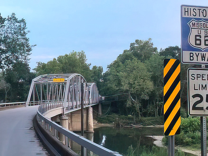 The Devil's Elbow Bridge stretches across the Big Piney River like a steel poem. Engineering never looked so nostalgic.
