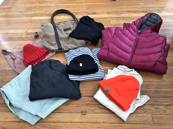 A fashion haul that would make any stylist proud: designer jackets, cozy sweaters, and beanies bright enough to be spotted in Portland fog. 