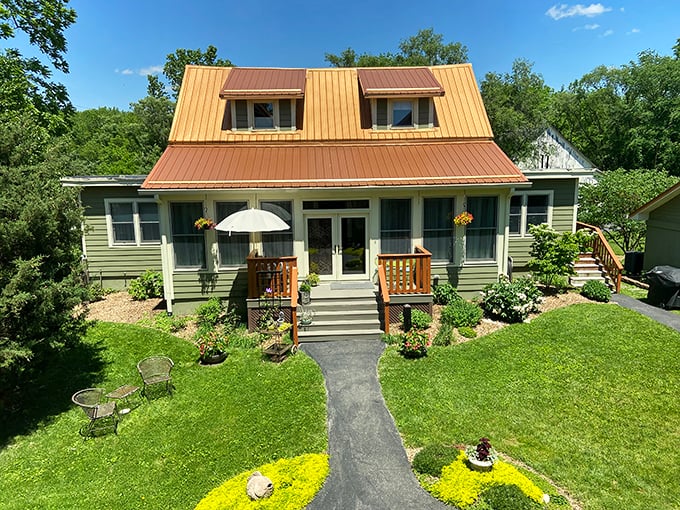 This copper-roofed cottage might be the closest you'll get to living in a Pottery Barn catalog without maxing out your credit card.