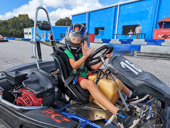 Future NASCAR star in training! The look of concentration says it all&mdash;this is serious fun that creates lasting memories.