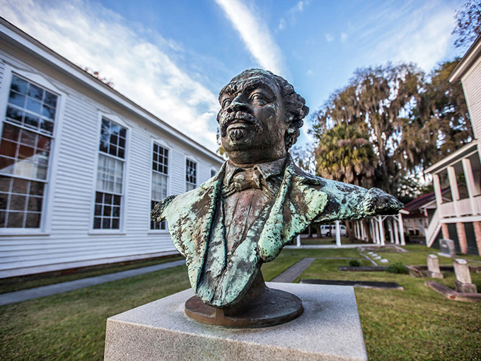 This weathered bronze bust stands sentinel to history, a silent storyteller in a town where every corner whispers of the past.