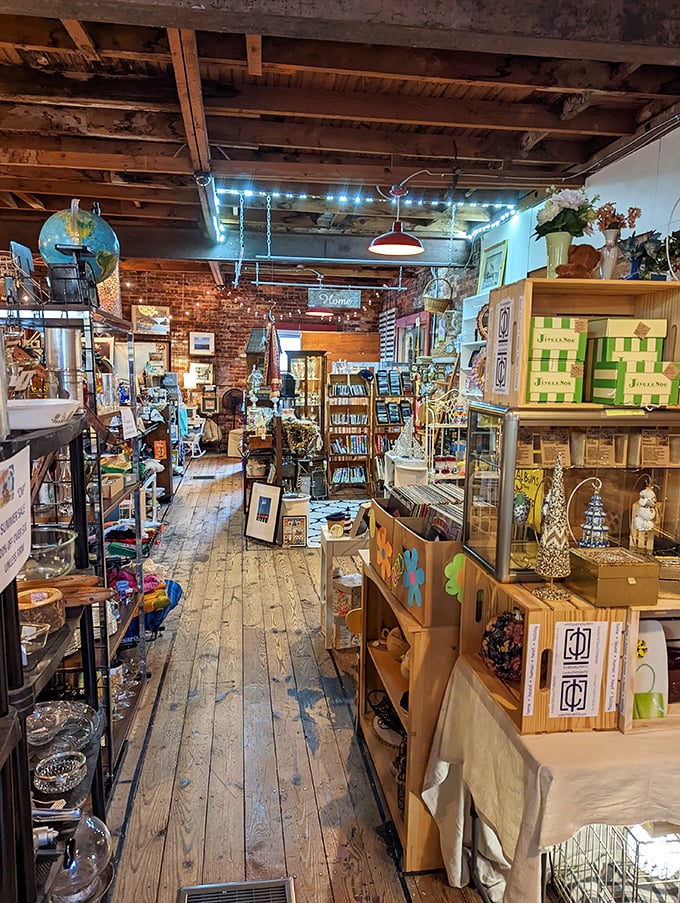 Exposed brick walls and weathered wooden floors create the perfect backdrop for your "I found it!" moment among carefully arranged treasures.