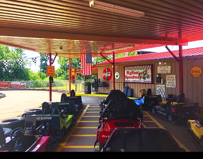 A rainbow fleet of racing chariots sits at attention, each bearing the stern but routinely ignored warning: "NO BUMPING."