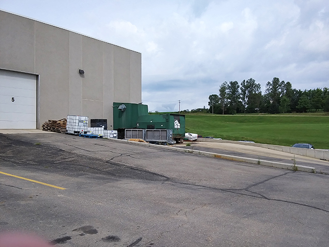 Baumgartner's storefront welcomes cheese pilgrims with whimsical charm &ndash; complete with a waiter statue who's been holding that tray since before smartphones existed. 