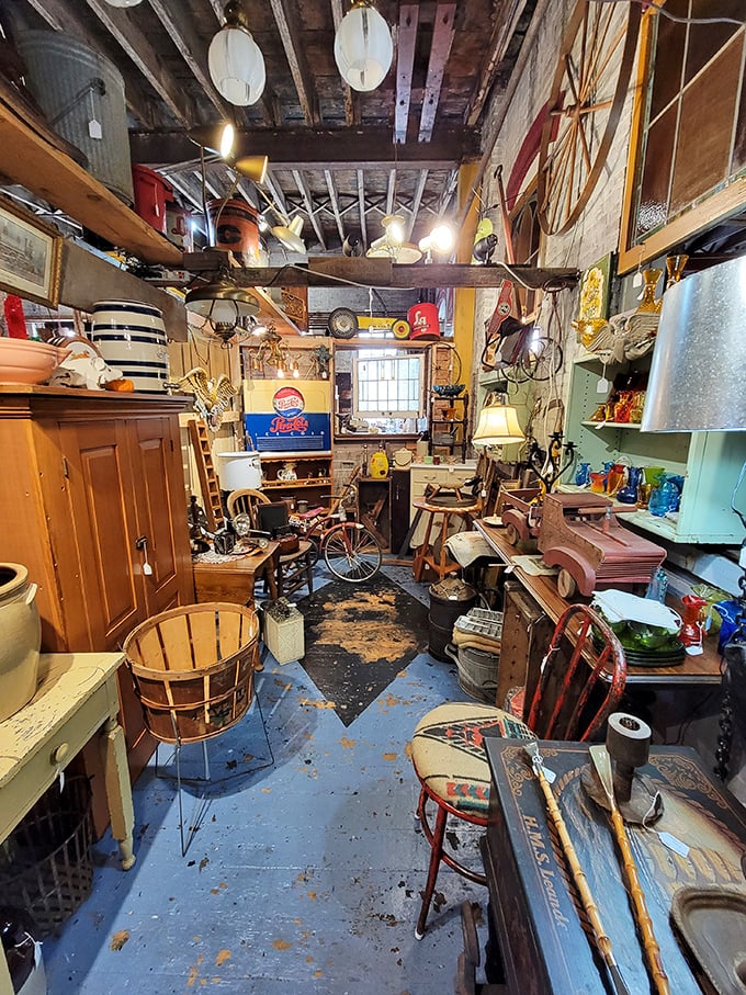 A mint-green shelf showcases a collection of vintage glassware that catches light like diamonds, each tumbler holding stories of celebrations past.