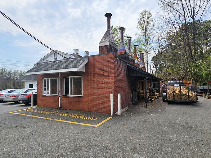 Those smokestacks aren't just for show—they're working chimneys that have been turning pork shoulders into smoky perfection for decades.