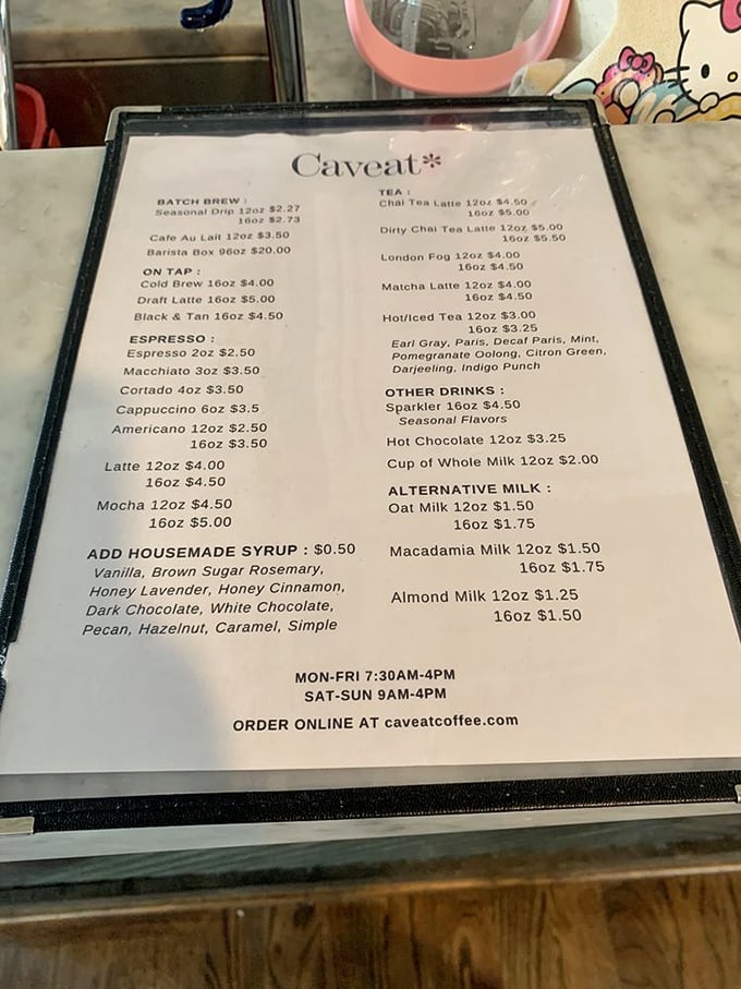 A menu that reads like a love letter to coffee enthusiasts, with enough variety to satisfy both purists and those who prefer their caffeine dressed up a bit. 