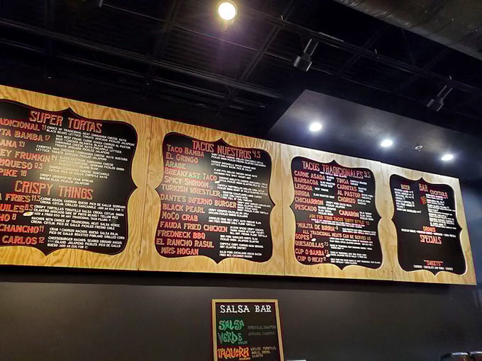 The menu board reads like a love letter to Mexican street food, with traditional tacos on one side and Taco Bamba's creative riffs on the other.