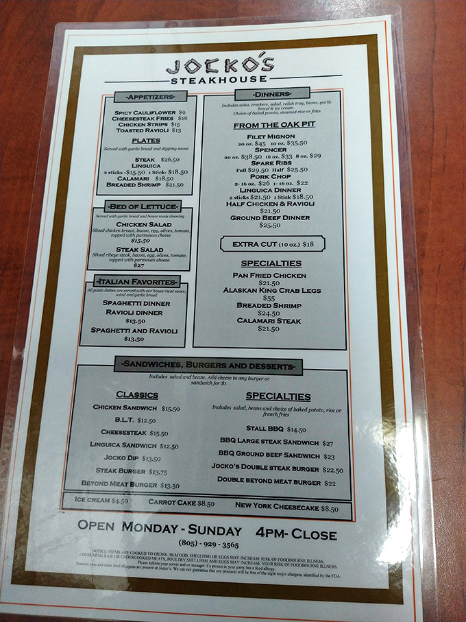 A menu that cuts to the chase: meat, sides, and zero pretension. The paper might be plain, but what it promises is pure California oak-fired poetry.