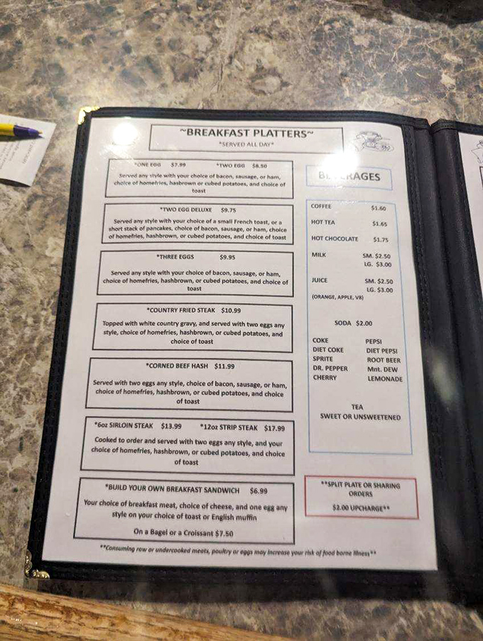 This menu isn't just a list of food&mdash;it's a financial time machine where $10.99 still buys you country fried steak, eggs, potatoes, AND toast. My cardiologist just fainted. 