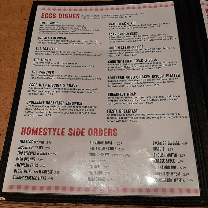 The menu reads like a love letter to American comfort food classics, with breakfast served all day because pancakes know no time zone.
