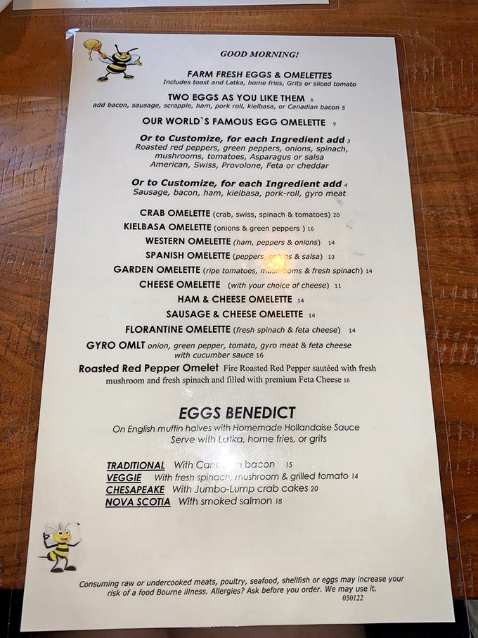 This isn't just a menu&mdash;it's a roadmap to breakfast nirvana. The bee mascot isn't just cute; he's warning you about the impending food coma.