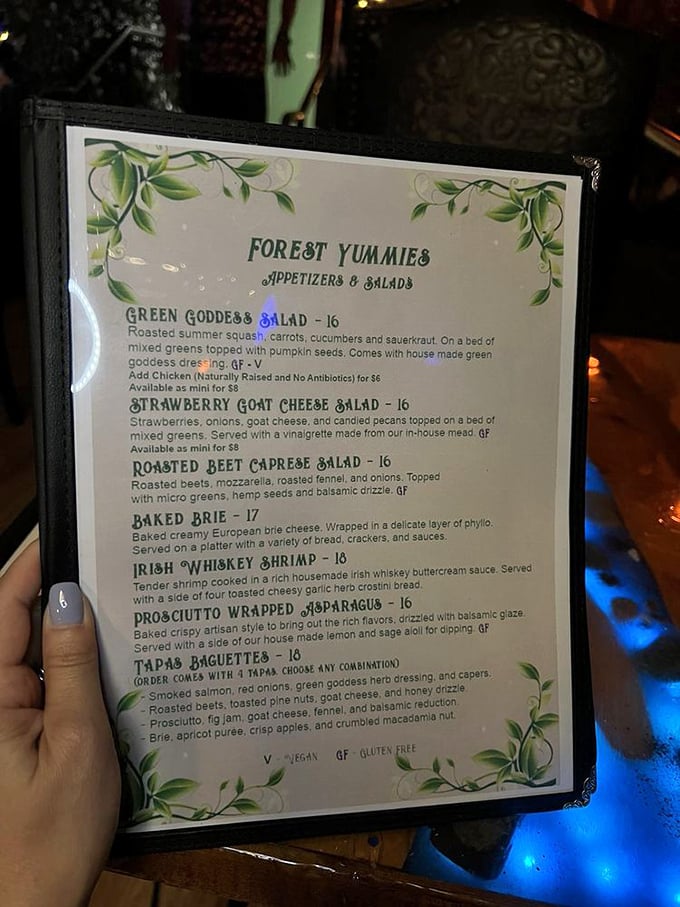 The "Forest Yummies" menu reads like a spellbook of culinary delights, each dish promising its own magical experience.