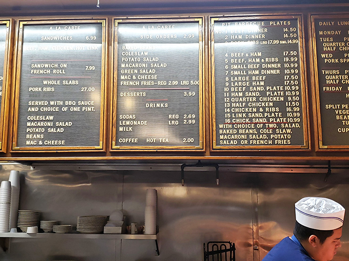This menu board isn't just a list of options&mdash;it's a roadmap to happiness. Each number represents a different journey into barbecue bliss.