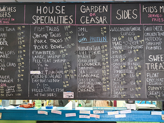 The chalkboard menu—a living document of oceanic treasures—changes with the tides and catches, just as nature intended.