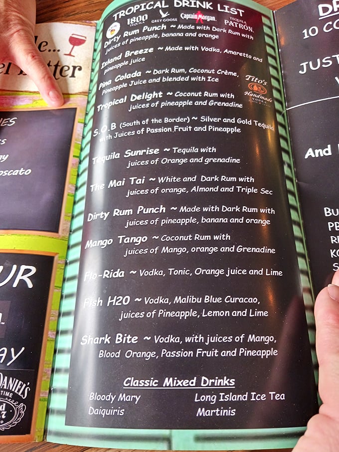 The tropical drink menu reads like a passport to vacation. One sip of that Dirty Rum Punch and you're mentally beach-bound, even in landlocked Ohio.