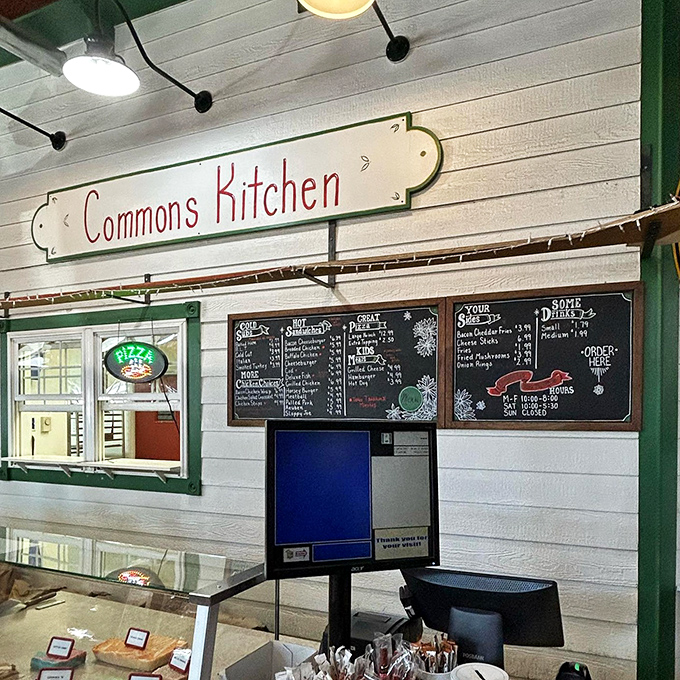 The Commons Kitchen menu board promises sandwich salvation with the simplicity of handwritten chalk&mdash;no fancy digital displays needed when the food speaks this loudly.