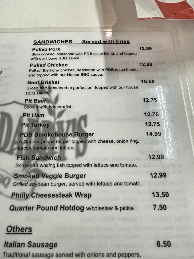 The menu reads like barbecue poetry&mdash;pulled pork, beef brisket, pit beef with horseradish&mdash;each entry a promise of smoky satisfaction to come.