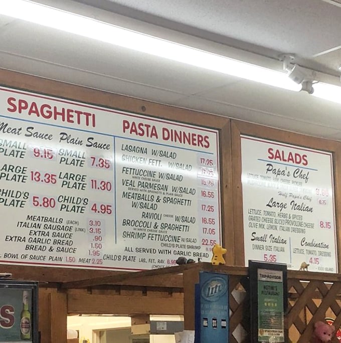 This menu board isn't just displaying prices; it's offering time travel to when extraordinary Italian food didn't require a second mortgage.