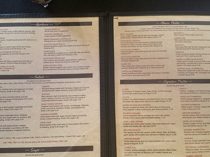 The menu reads like a love letter to Italian-Mediterranean cuisine, with those famous crab cakes hiding modestly among pasta classics and seafood specialties.