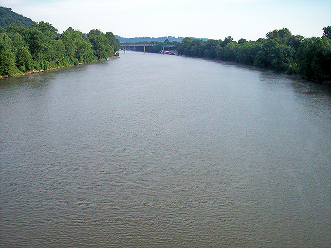 The Muskingum River flows with quiet confidence, a liquid highway that shaped Marietta's destiny long before interstate exits and GPS directions existed.