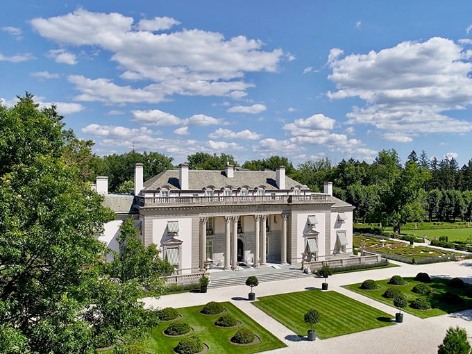 Ivy-draped elegance that whispers "old money" without being snooty about it. This historic mansion along the byway exudes charm from every perfectly proportioned window. 