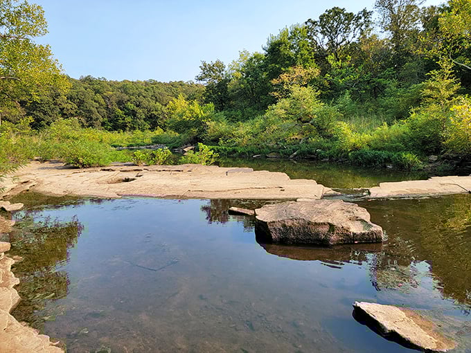 Crystal-clear waters reflect the surrounding wilderness at Sand Creek. Mother Nature showing off her mirror selfie skills without a filter.