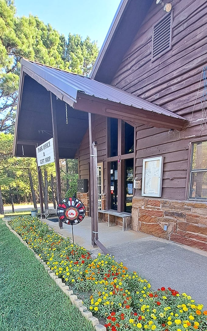 This rustic park office and gift shop, adorned with cheerful marigolds, serves as command central for your outdoor adventures.