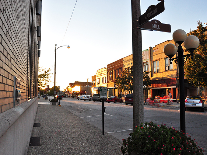 Golden hour bathes Pontiac's downtown in warmth that feels like a hug from your favorite aunt&mdash;the one who always has cookies waiting.