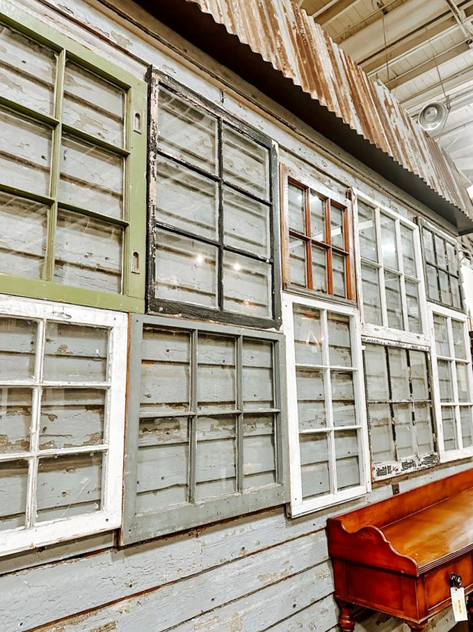 Window shopping takes on a whole new meaning with this wall of salvaged frames. Each pane offers a glimpse into history and your home's potential future. 