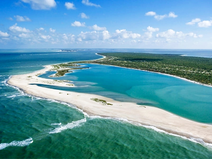 From above, Cayo Costa reveals its true character: a slender ribbon of paradise caught between the Gulf and Pine Island Sound.