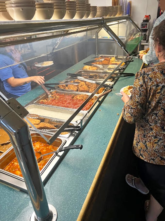 The buffet line &ndash; where dreams are made and diets go to die. Each steaming tray promises a different journey into Southern comfort. 