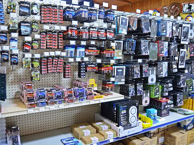 Electronics heaven! This pegboard wonderland offers gadgets galore for tech enthusiasts who'd rather spend money on experiences than full retail prices.