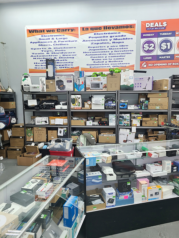 The bilingual "What We Carry" sign tells the tale&mdash;from electronics to furniture, this isn't your average discount store.