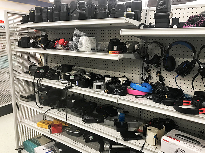 A technological time capsule awaits in the electronics section, where vintage cameras and gadgets from bygone eras sit patiently for their second act. 