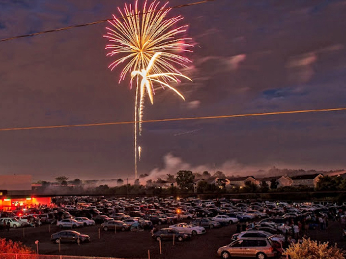 Who needs CGI explosions when you've got real fireworks? Fourth of July celebrations light up the night sky above moviegoers.