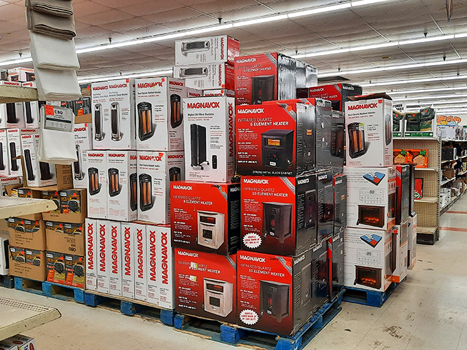 Magnox heaters stacked like a monument to winter preparedness. When manufacturers overproduce, Ollie's customers reap the warm, discounted rewards.