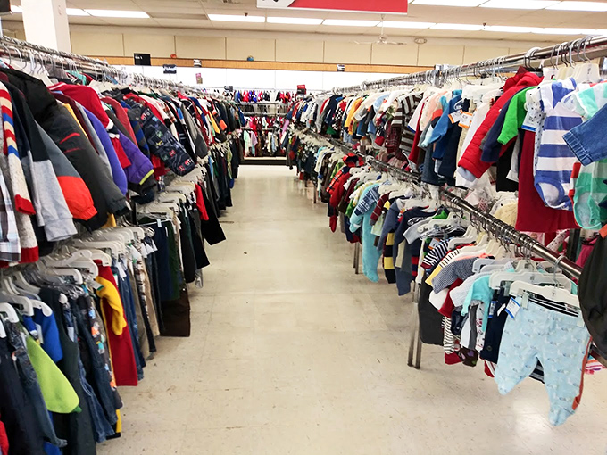 The children's clothing section tells stories through tiny garments&mdash;each superhero tee and miniature jean jacket representing childhood moments waiting for their next chapter.
