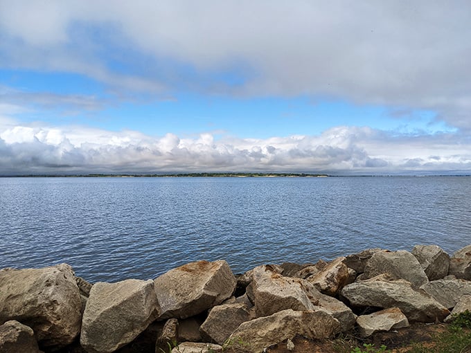 Where sky meets water in a perfect horizon line, creating the kind of vastness that makes your everyday problems suddenly seem manageable.